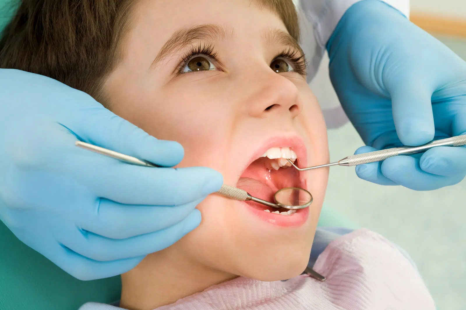 What to do for a Permanent Tooth Growing in Front of a Baby Tooth ...